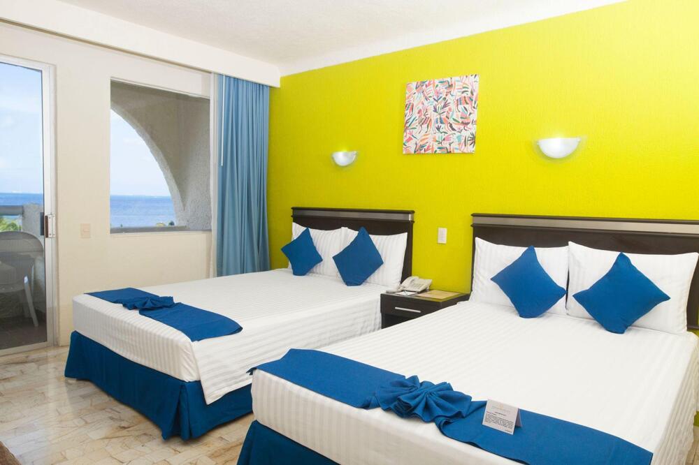 Hotel Aquamarina Beach Resort, Cancún. Desde 80.7€ - Centraldereservas.com