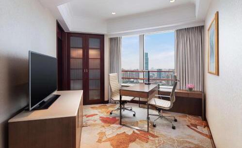 Radisson Blu Hotel Shanghai New World, Shanghai - Central de Reservas